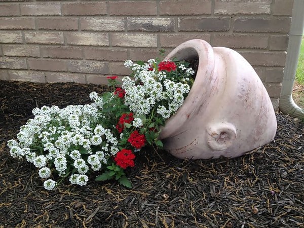 15 Wonderful DIY Spilling Flower Pot Will Spill Joy Into Your Garden
