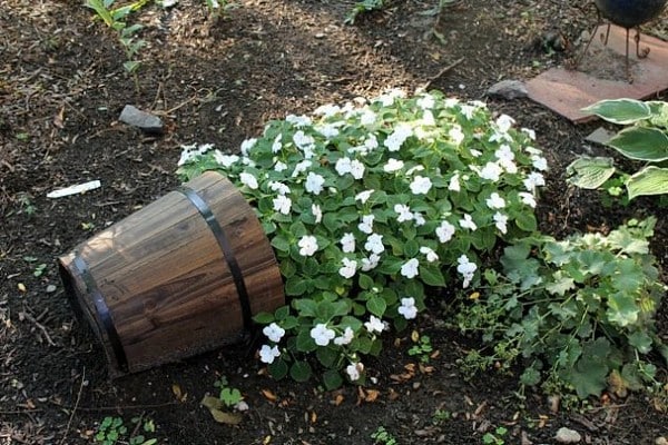 15 Wonderful DIY Spilling Flower Pot Will Spill Joy Into Your Garden